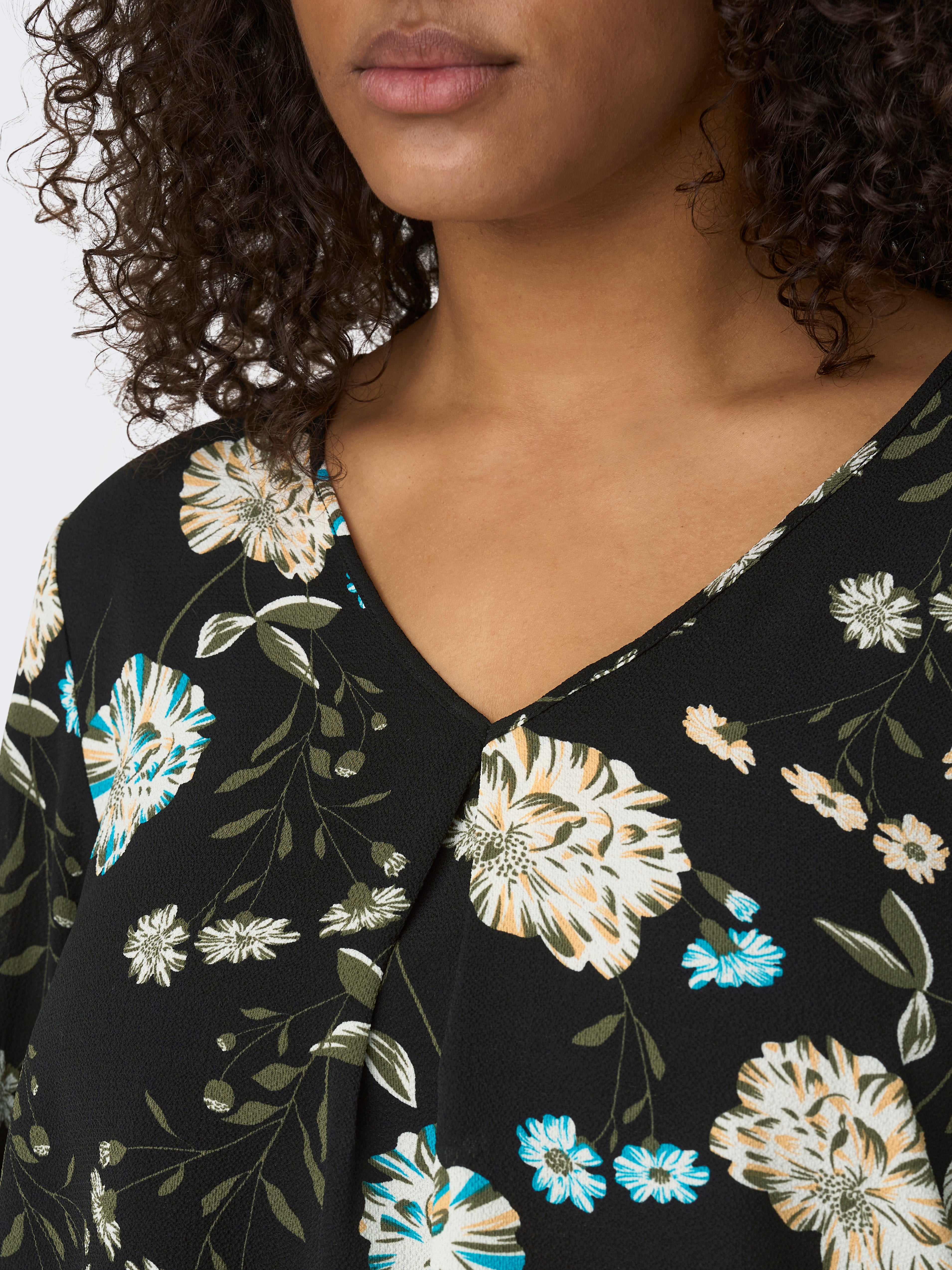 Tops Regular Fit Col en V avec une remise de 20% | ONLY®